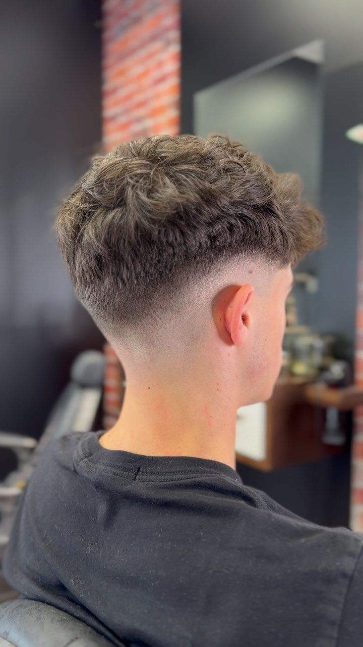 Top 10 Low Drop Fade Ideas for a Fresh Look - BeastBeauty